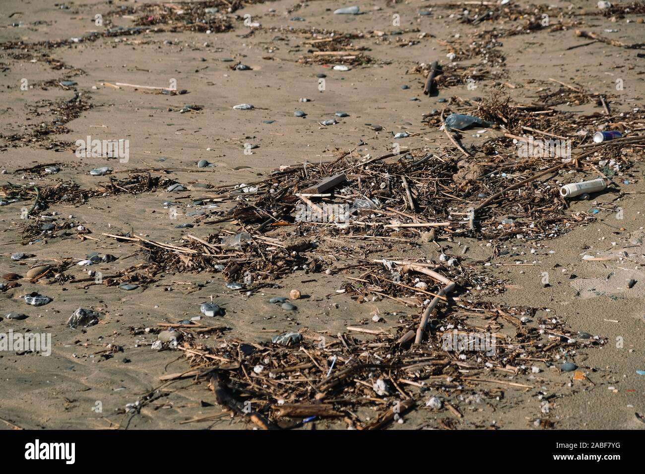Micro plastic pollution on sea coast over blur background,planet save ...