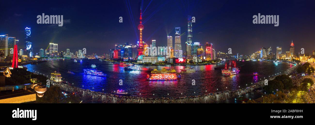 A grand light show is performed at the Bund with local landmarks as ...