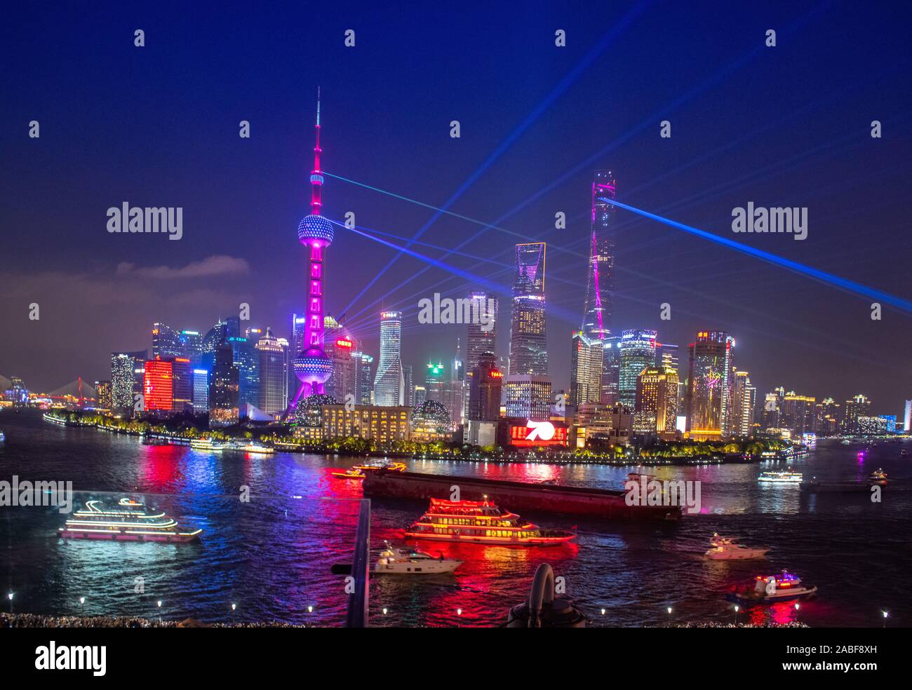 A grand light show is performed at the Bund with local landmarks as ...