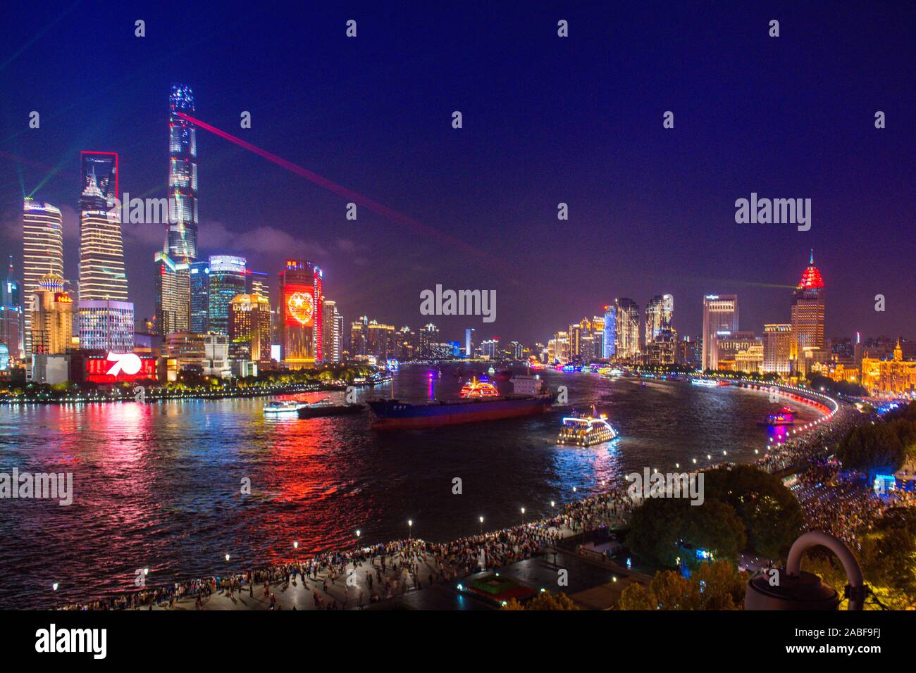 A grand light show is performed at the Bund with local landmarks as ...
