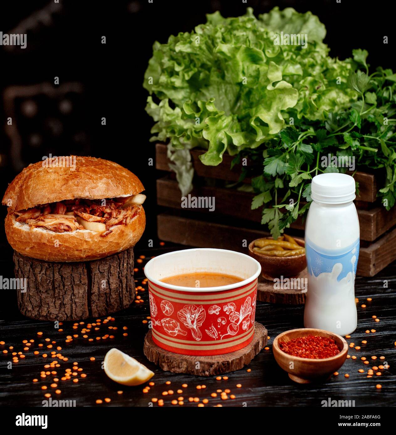 chicken doner, lentil soup and ayran in bottle Stock Photo - Alamy