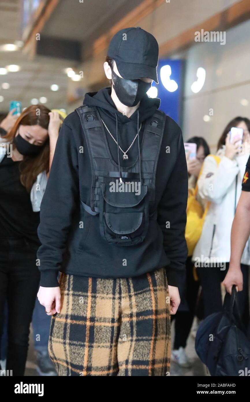 Chinese singer and rapper Cai Xukun arrives at a Beijing airport after ...