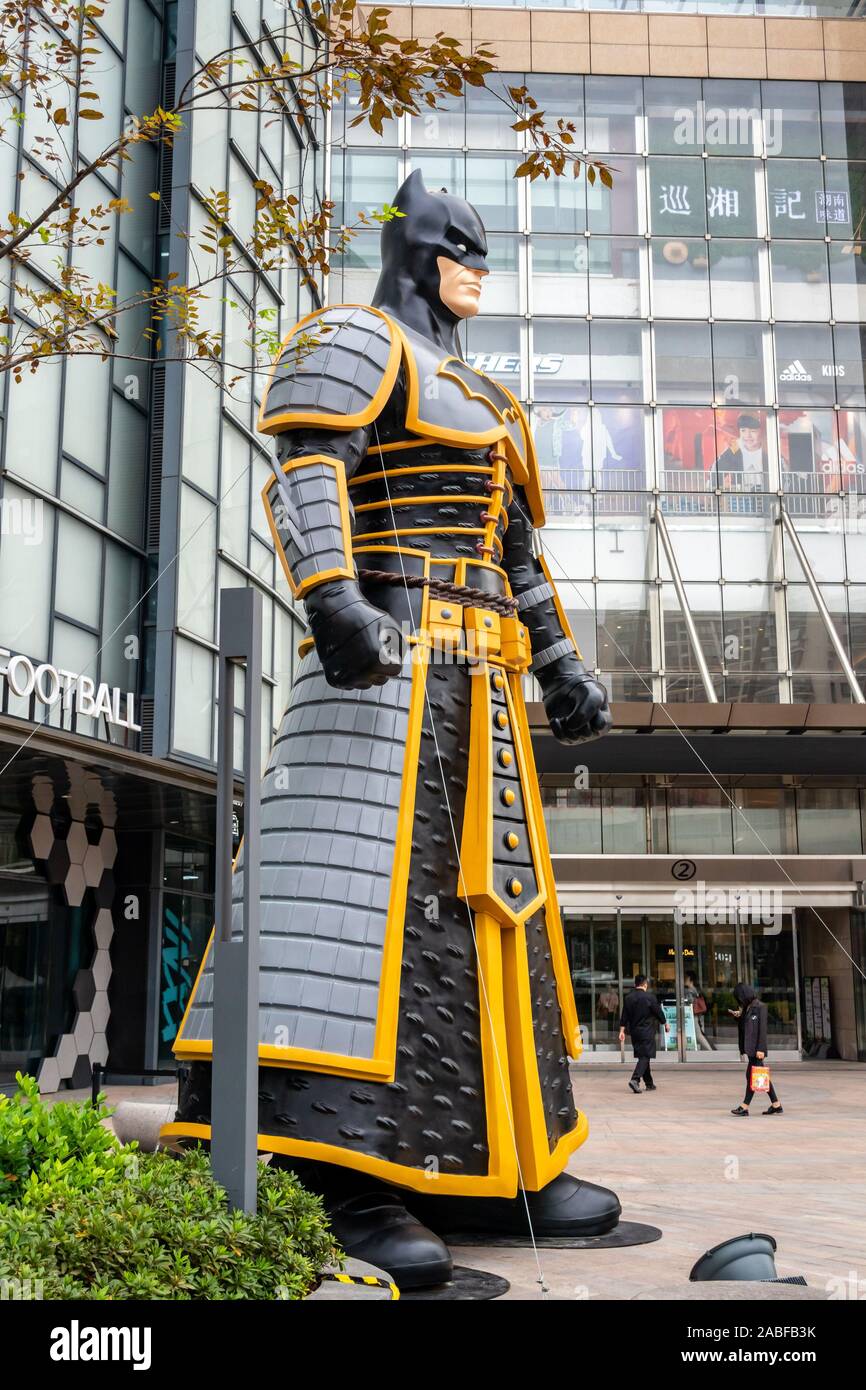 An eight-meter-high sculpture of fictional superhero Batman appears to ...