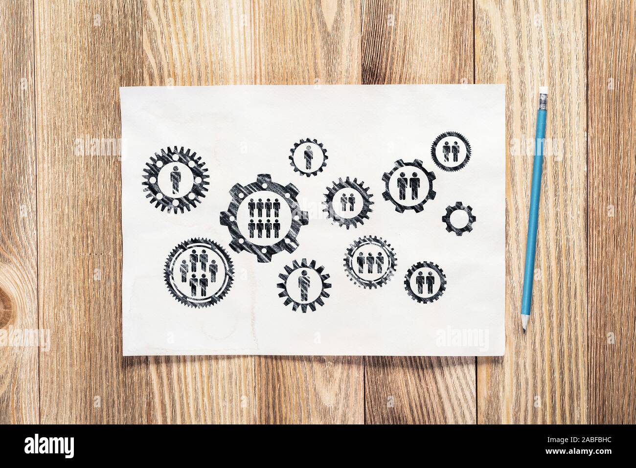 Social structure hand drawn with gears Stock Photo - Alamy