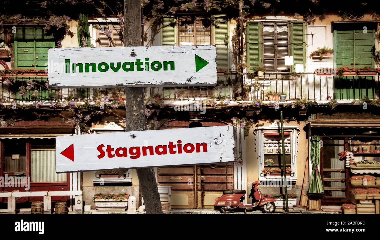 Street Sign the Direction Way to Innovation versus Stagnation Stock ...
