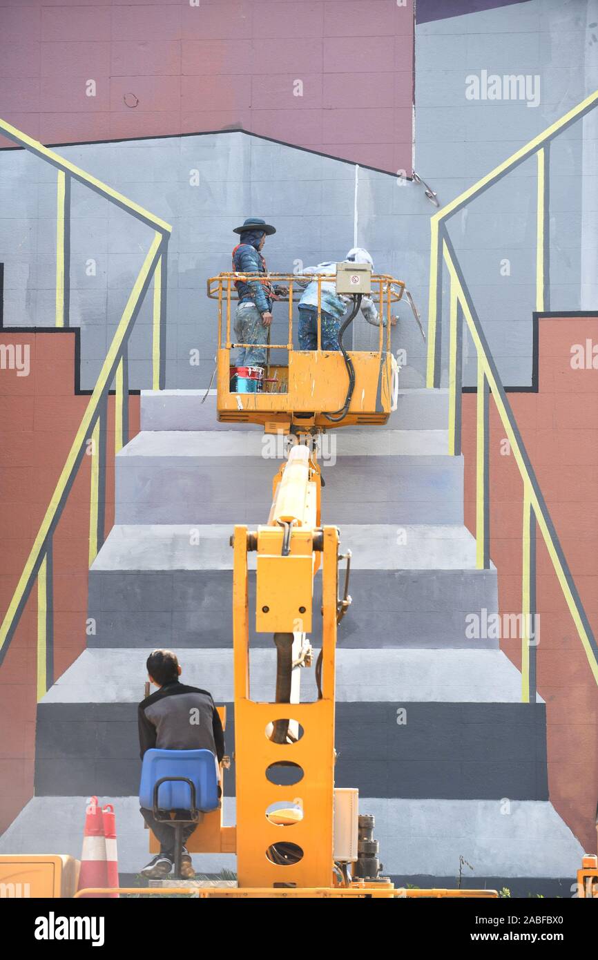 Artists draw the 60-meter-high mural, 14 meters higher than the ...