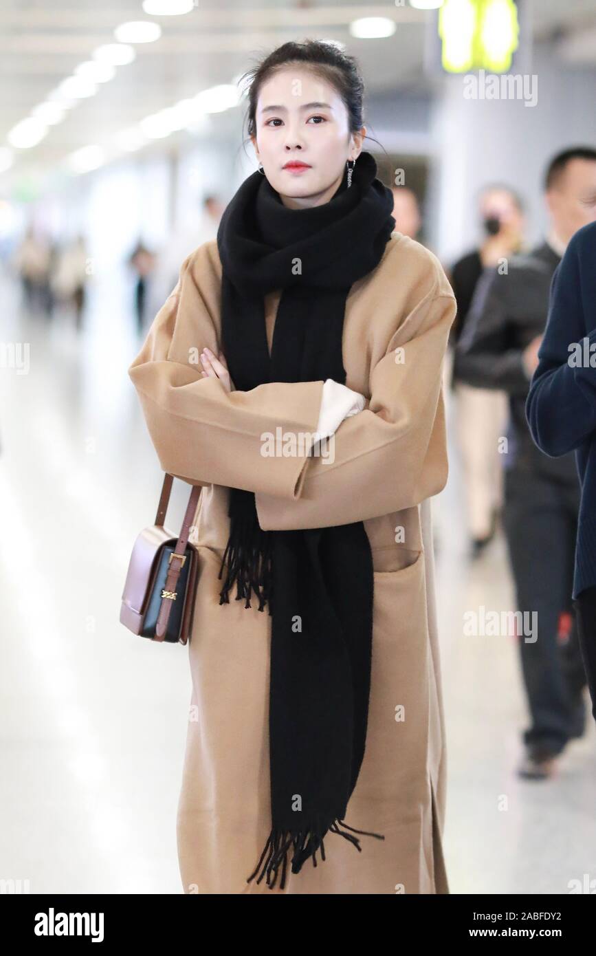 Chinese actress Bai Lu arrives at a Beijing airport before departure in ...