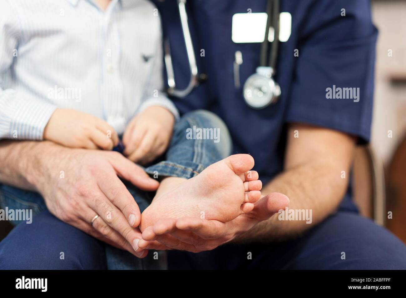 Doctor Examines Boy High Resolution Stock Photography and Images - Alamy