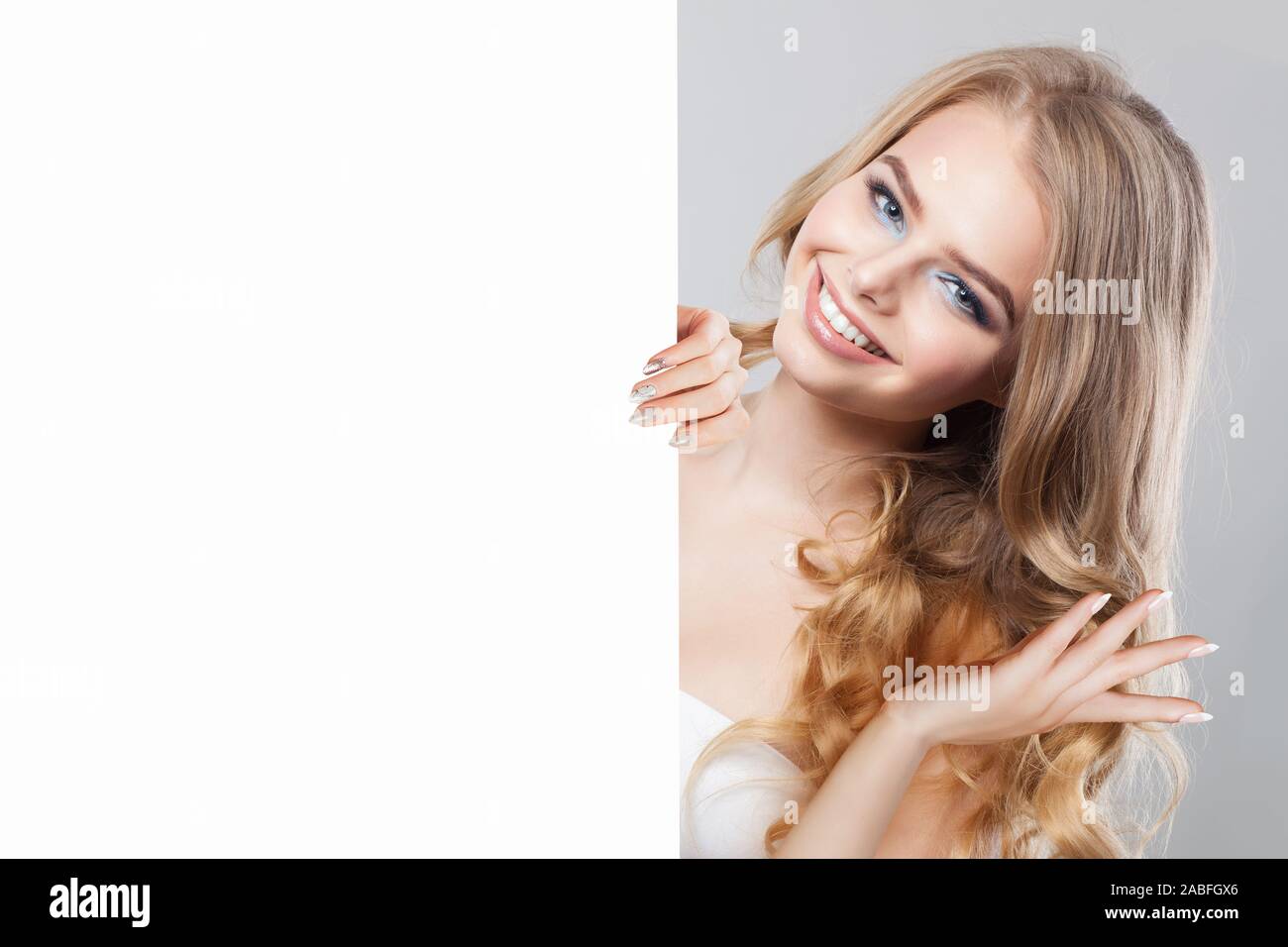 Pretty girl with placard hi-res stock photography and images - Alamy
