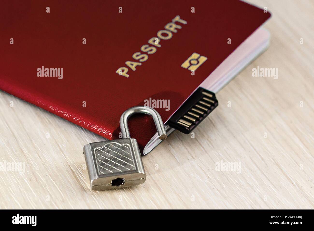 passports red on a white background with the opened lock Stock Photo ...
