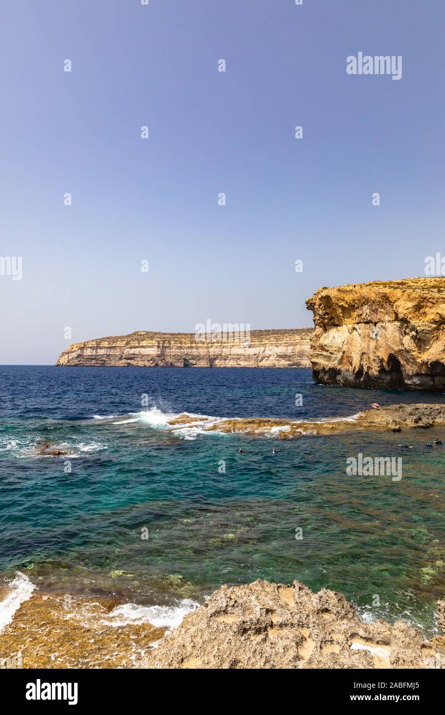 Stunning view at the coast of Dwejra Bay with the ruin of Azure Window ...
