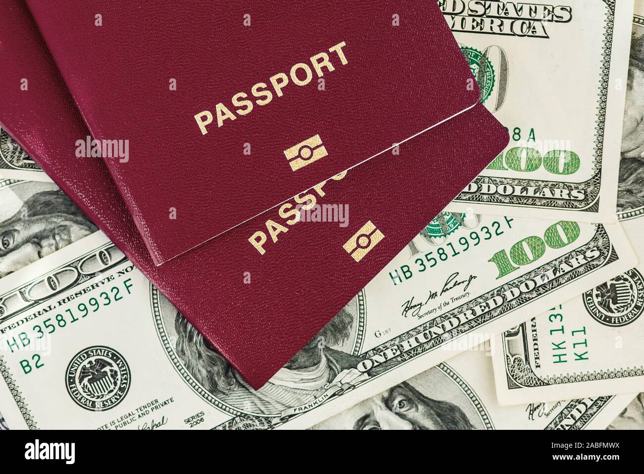 Passports and money over white background Stock Photo - Alamy