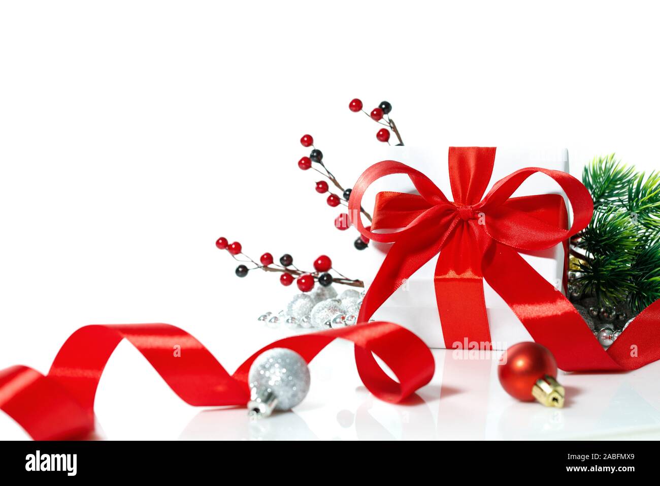 Christmas gift bow with red satin ribbow with decororation and copy ...