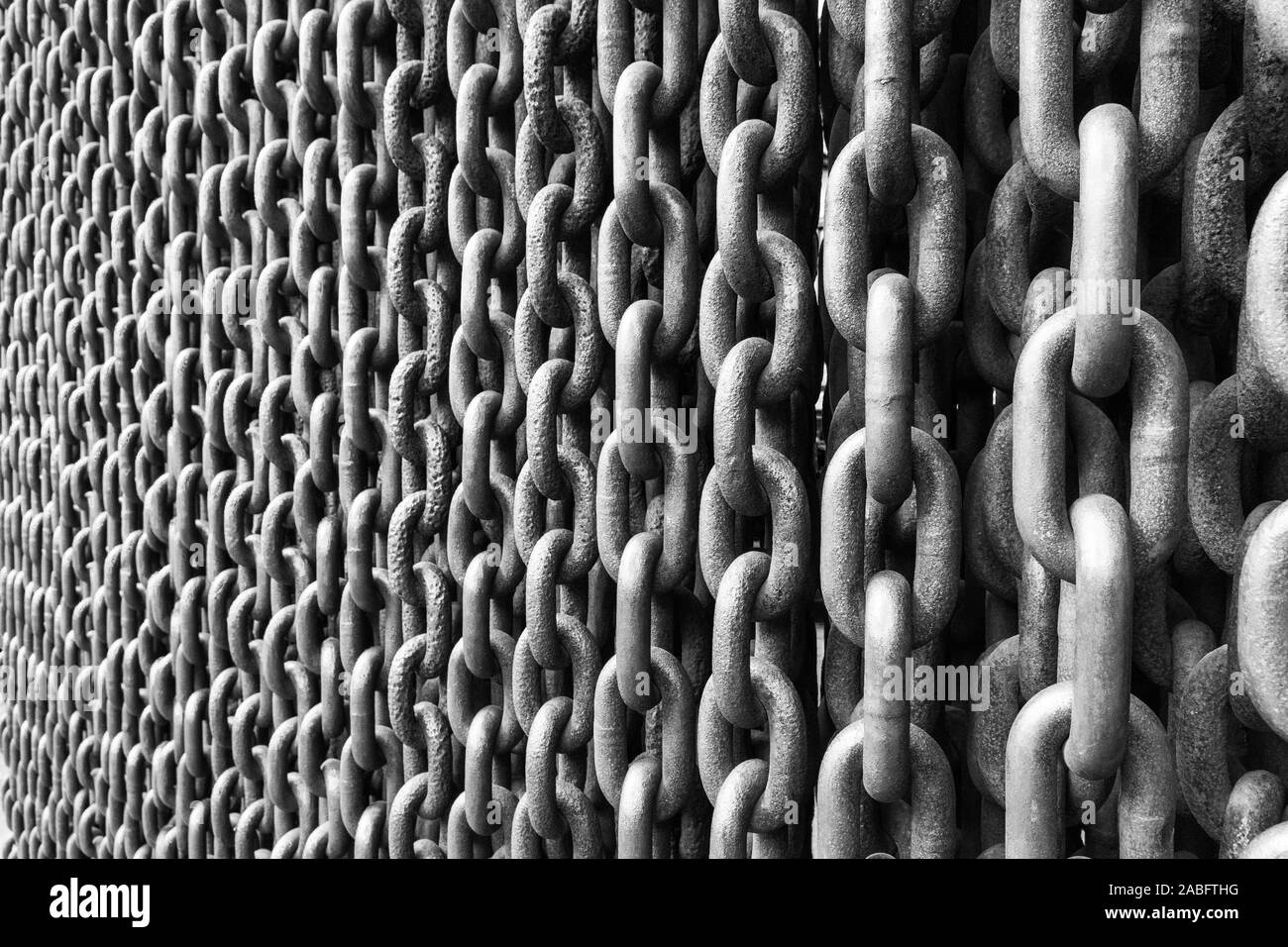 Black and white picture wall of large anchor chains Stock Photo - Alamy