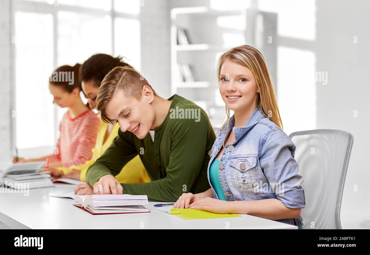 high school students with books and notebooks Stock Photo - Alamy