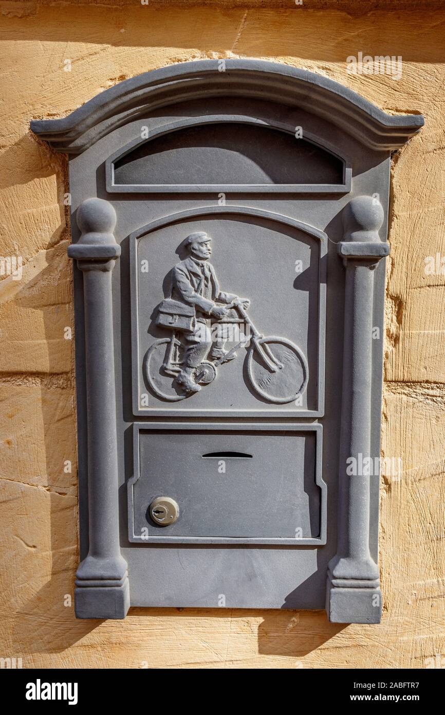 Domestic letterbox on the outside of a house on Gozo, Malta. Metalwork ...