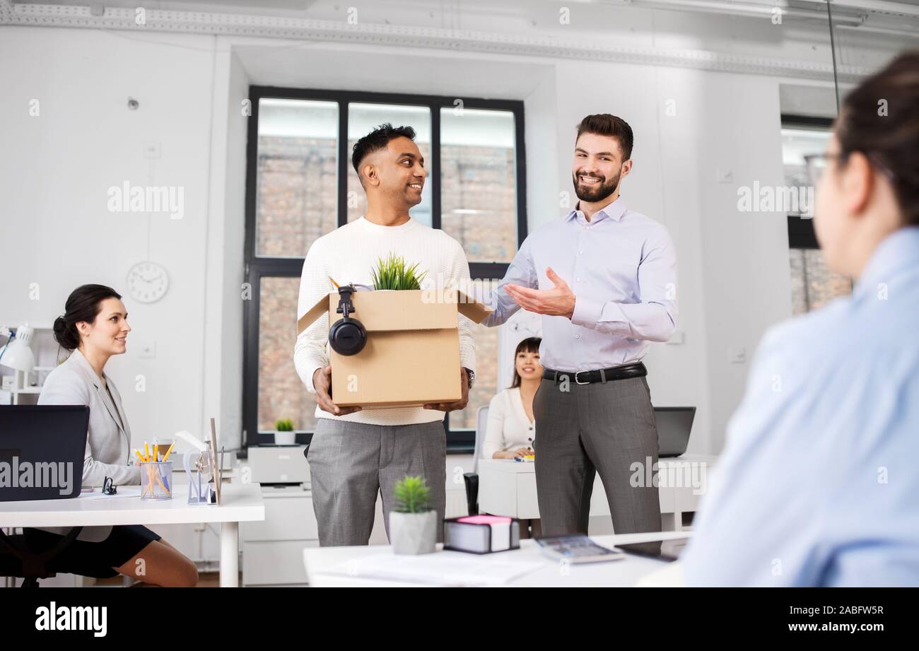 new male employee meeting colleagues at office Stock Photo - Alamy