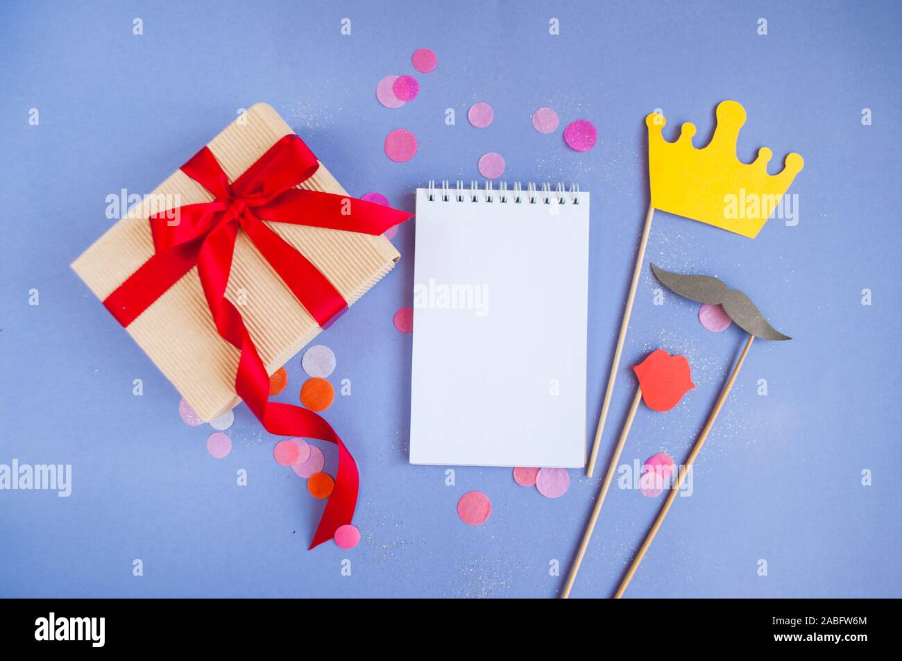 Colorful photo booth props crown, moustaches, glasses and lips on ...