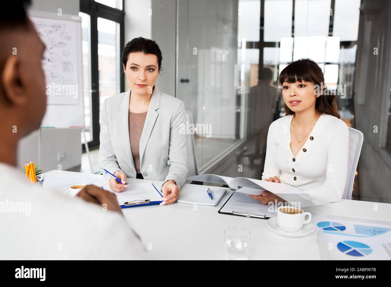 recruiters having job interview with employee Stock Photo - Alamy