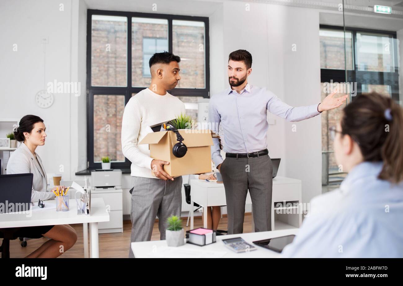 executive seeing off sad fired male office worker Stock Photo - Alamy