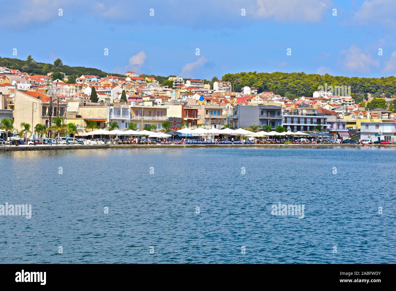 A scenic view of the waterfront buildings of Argostoli including a ...