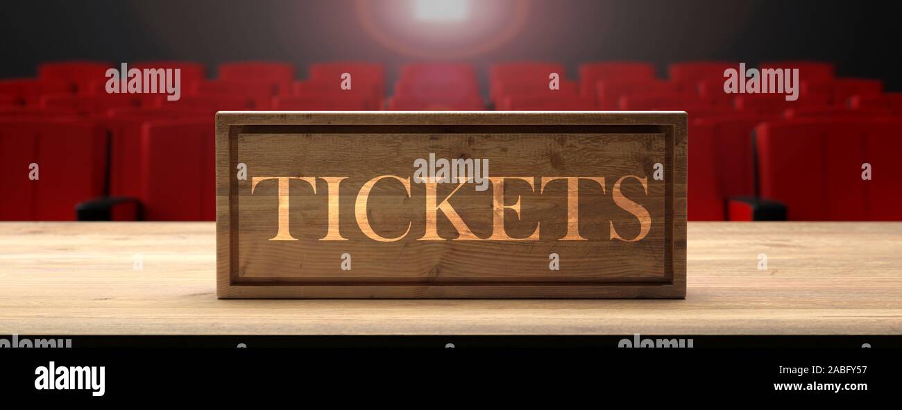 Tickets text, wood block sign on a wooden stage, blur cinema theater ...