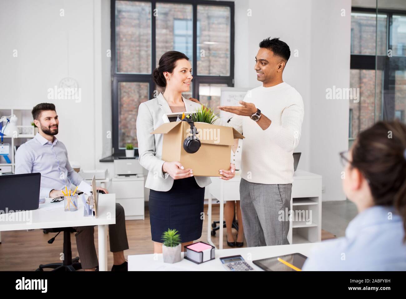new female employee with colleagues at office Stock Photo - Alamy