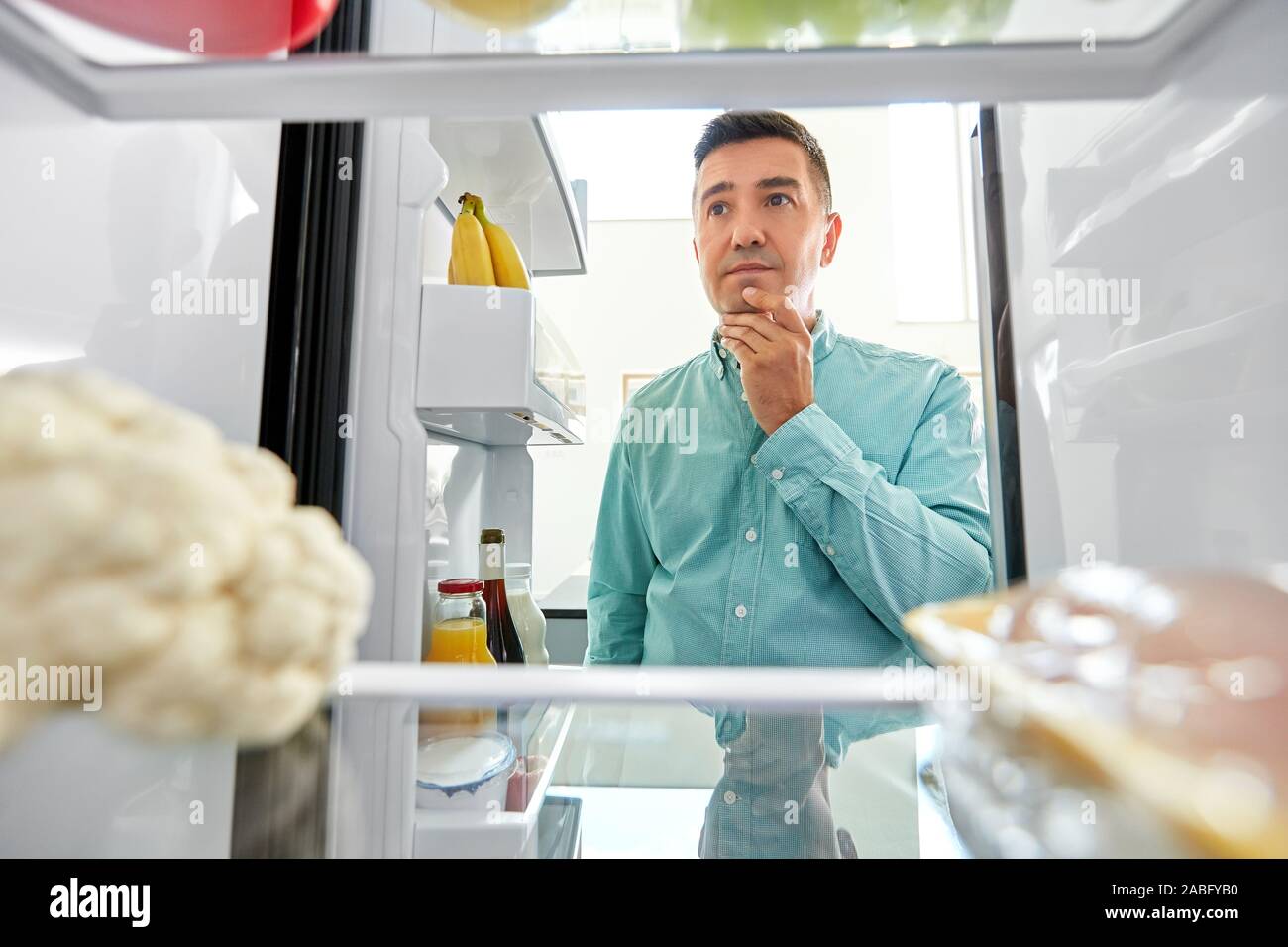 Man diet fridge hi-res stock photography and images - Alamy