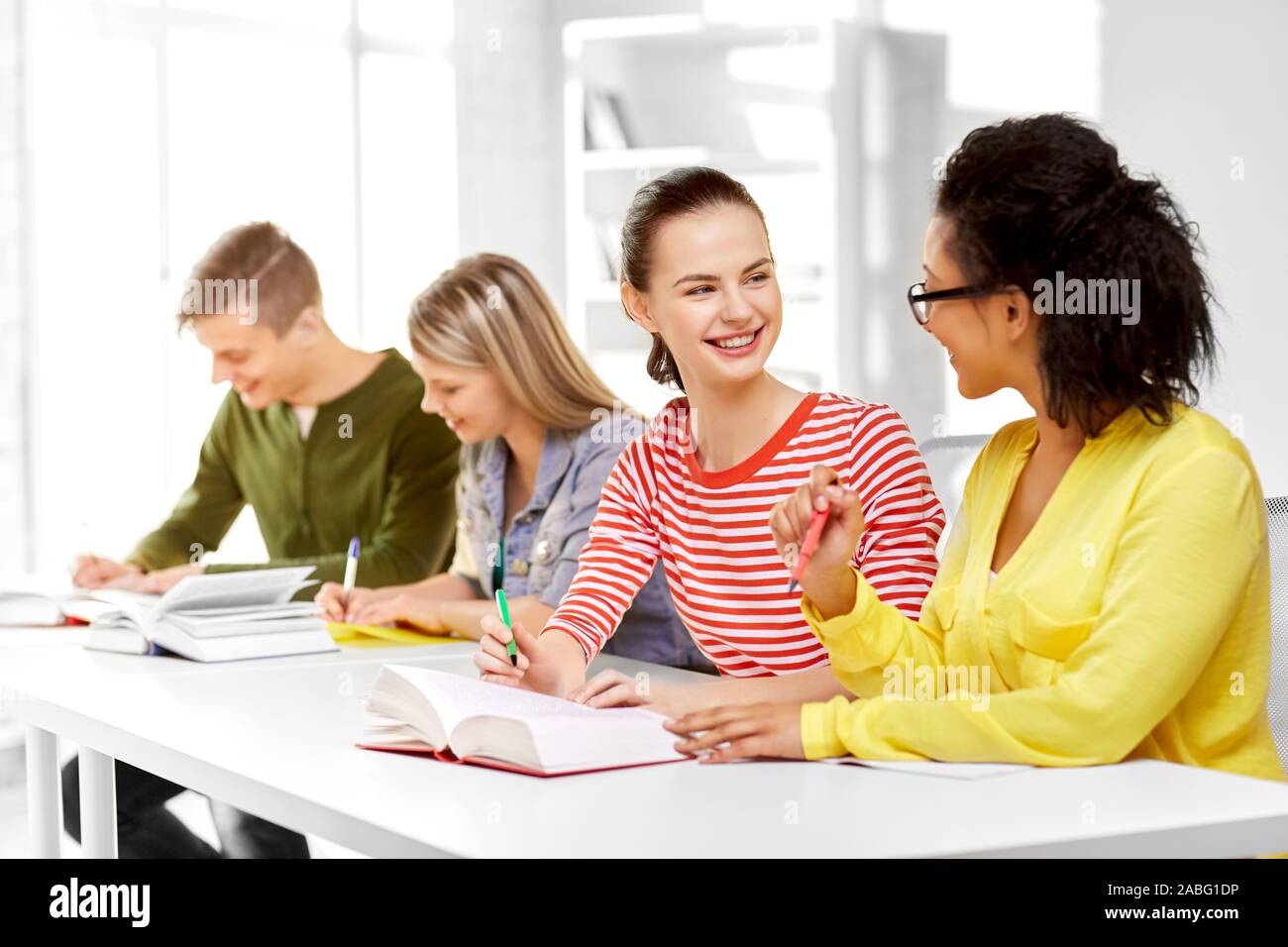 high school students with books and notebooks Stock Photo - Alamy