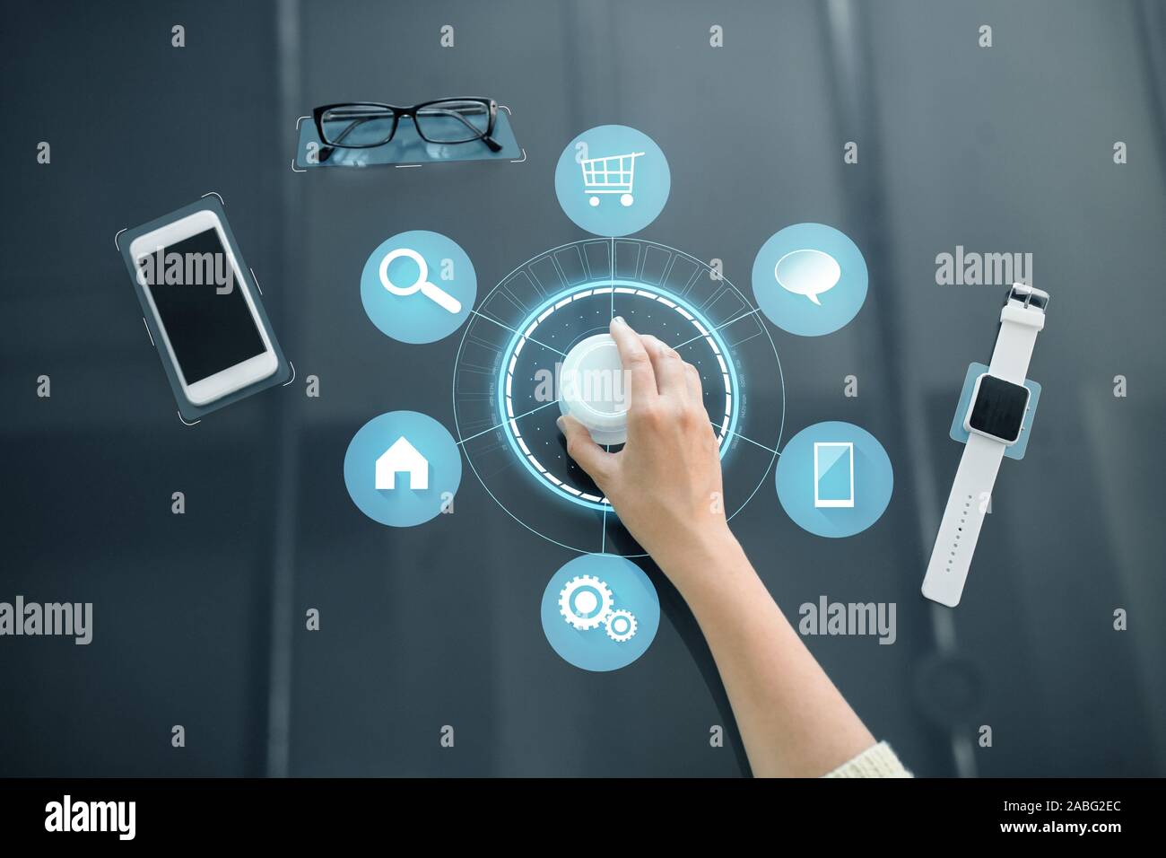 hand with app icons on interactive panel Stock Photo - Alamy