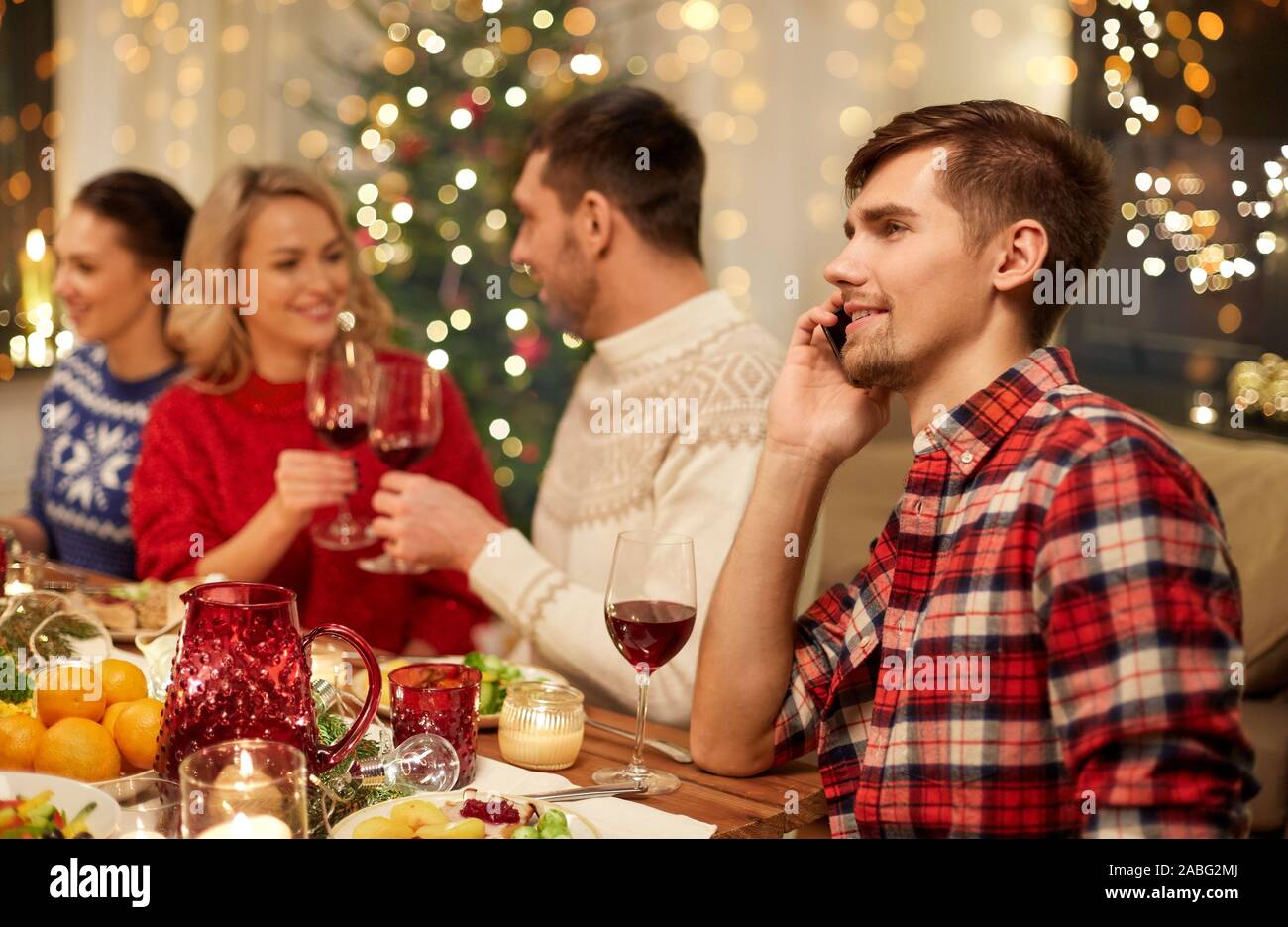 Christmas man dinner talking hi-res stock photography and images - Alamy