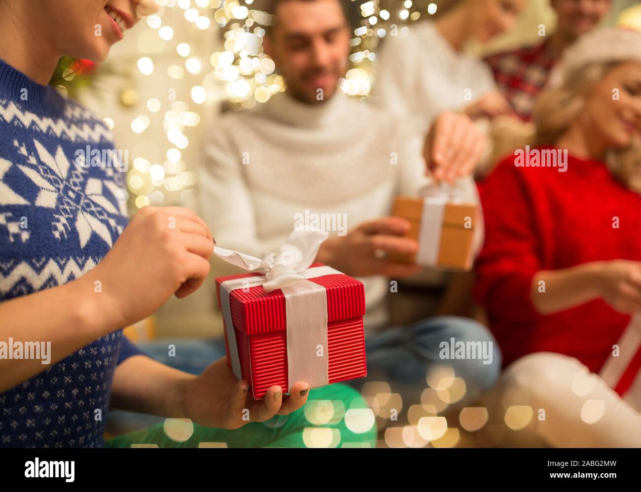 Close up of opening present hi-res stock photography and images - Alamy