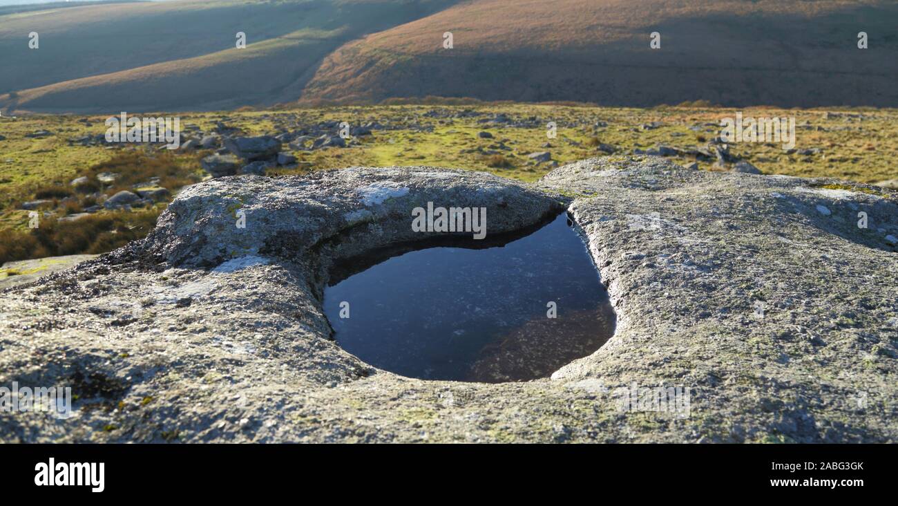 Small puddle in the stone in Dartmoor National Park, Devon Stock Photo ...