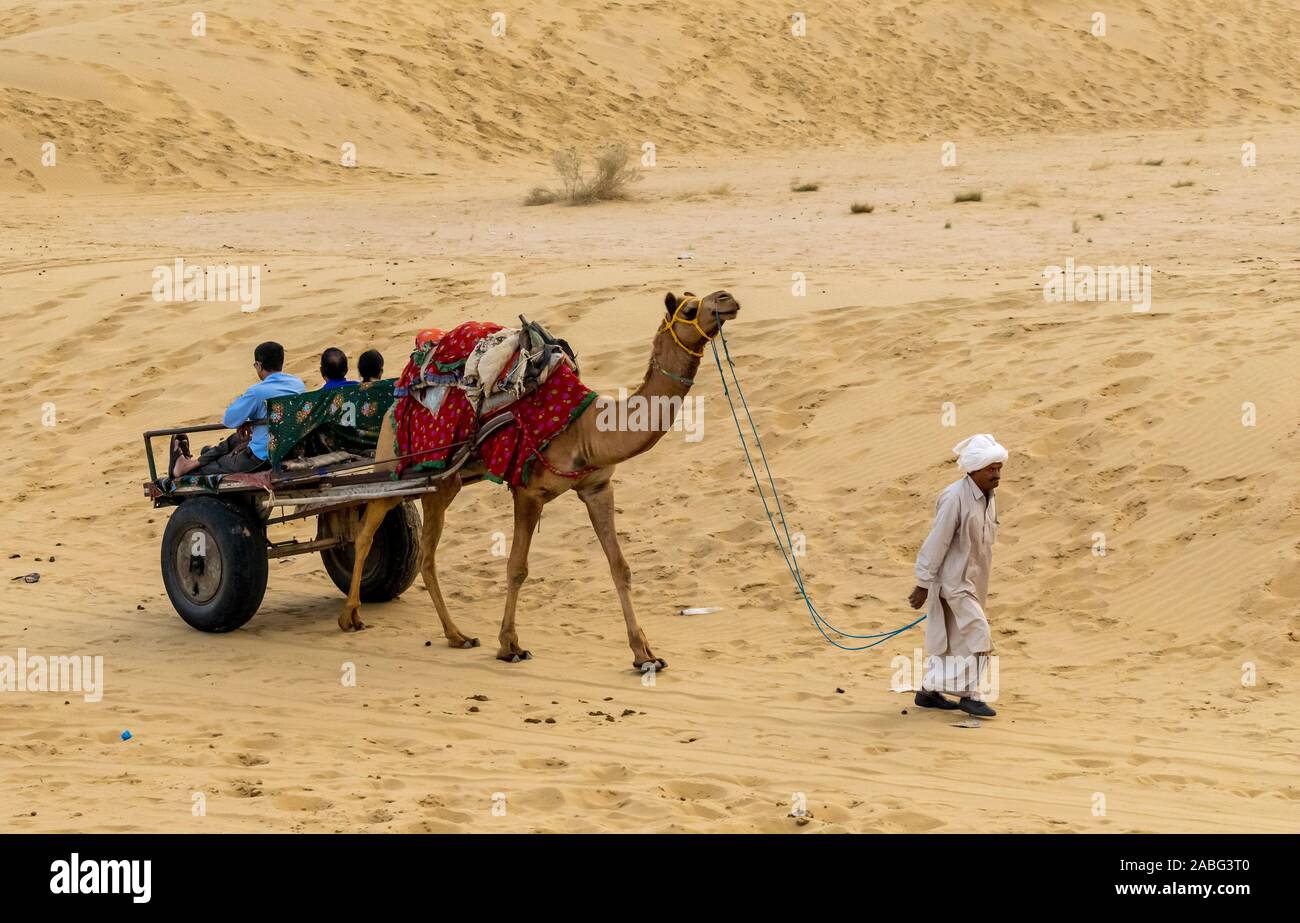 Sam Sand Dunes, Jaisalmer, Rajasthan, India; 24-Feb-2019; camel cart in ...