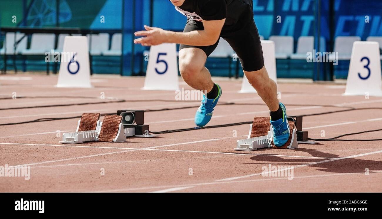 Start block hi-res stock photography and images - Alamy