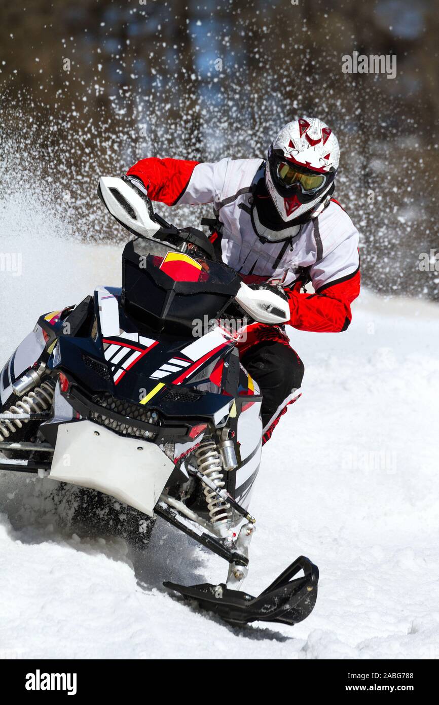 soaring in the snowmobile race Stock Photo - Alamy
