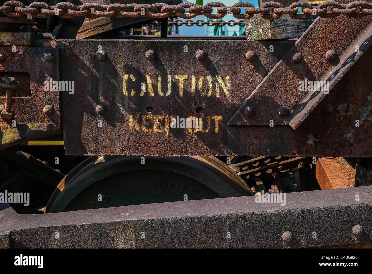 Rusty Caution Keep Out Stock Photo - Alamy