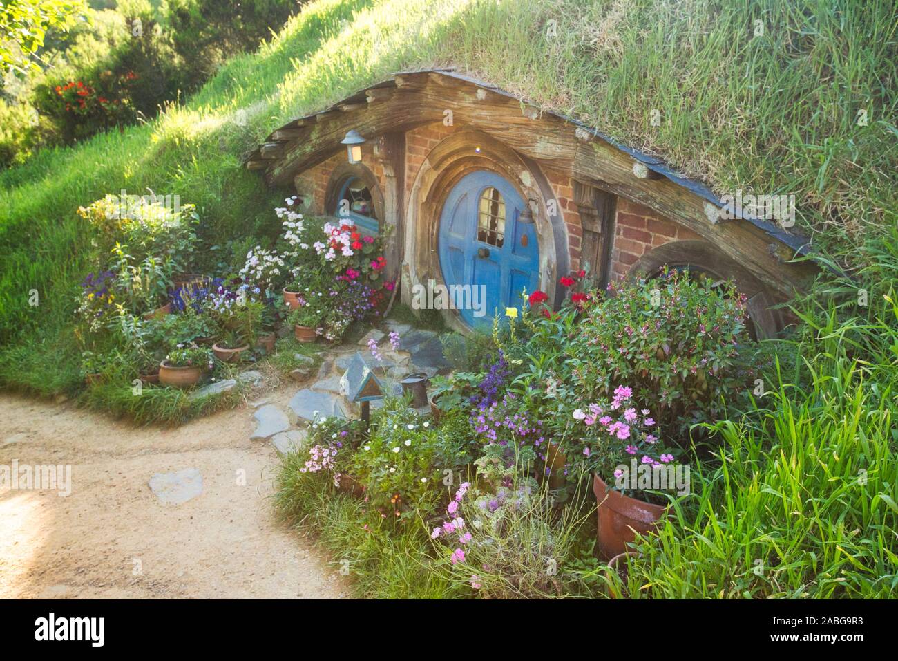 Hobbit House in the Shire, Hobbiton Movie Set, New Zealand Stock Photo ...