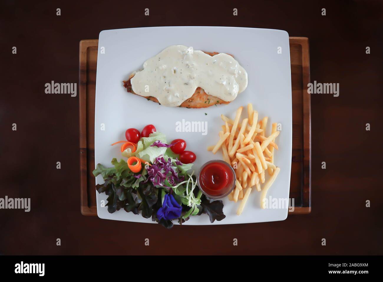 catfish steak, catfish steak with white cream sauce topping Stock Photo ...