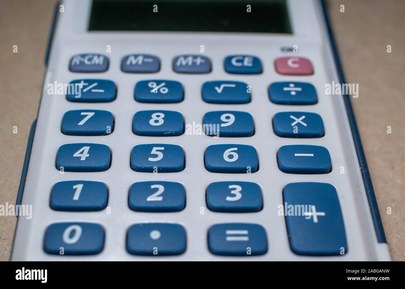 calculator with blue keys on white background Stock Photo - Alamy