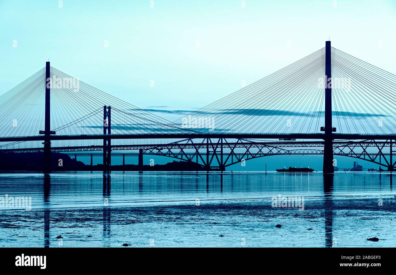 Sunrise view of the three major bridges crossing the Firth of Forth at ...