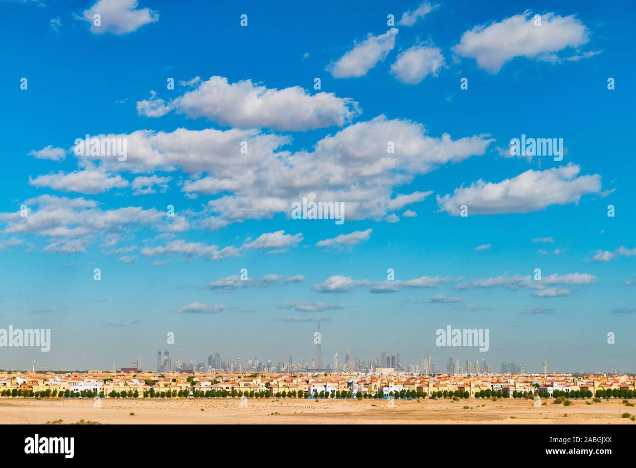 Skyline of Dubai with modern luxury villas at The Villa residential ...