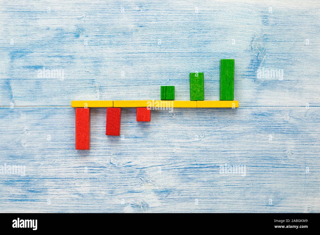 Bar graph showing continuous growth made of building blocks on blue ...