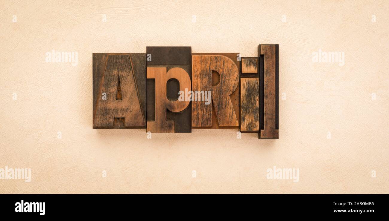 April, name of the month written with vintage letterpress printing ...