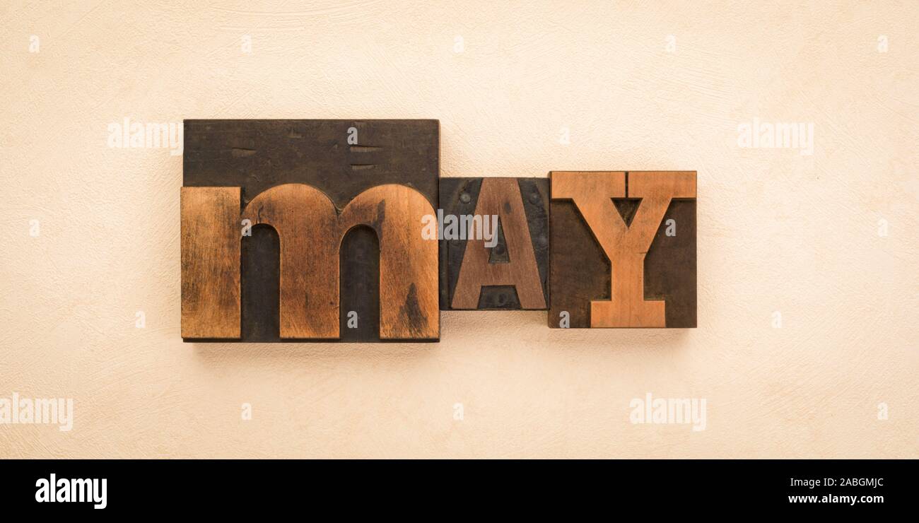 May, name of the month written with vintage letterpress printing blocks ...