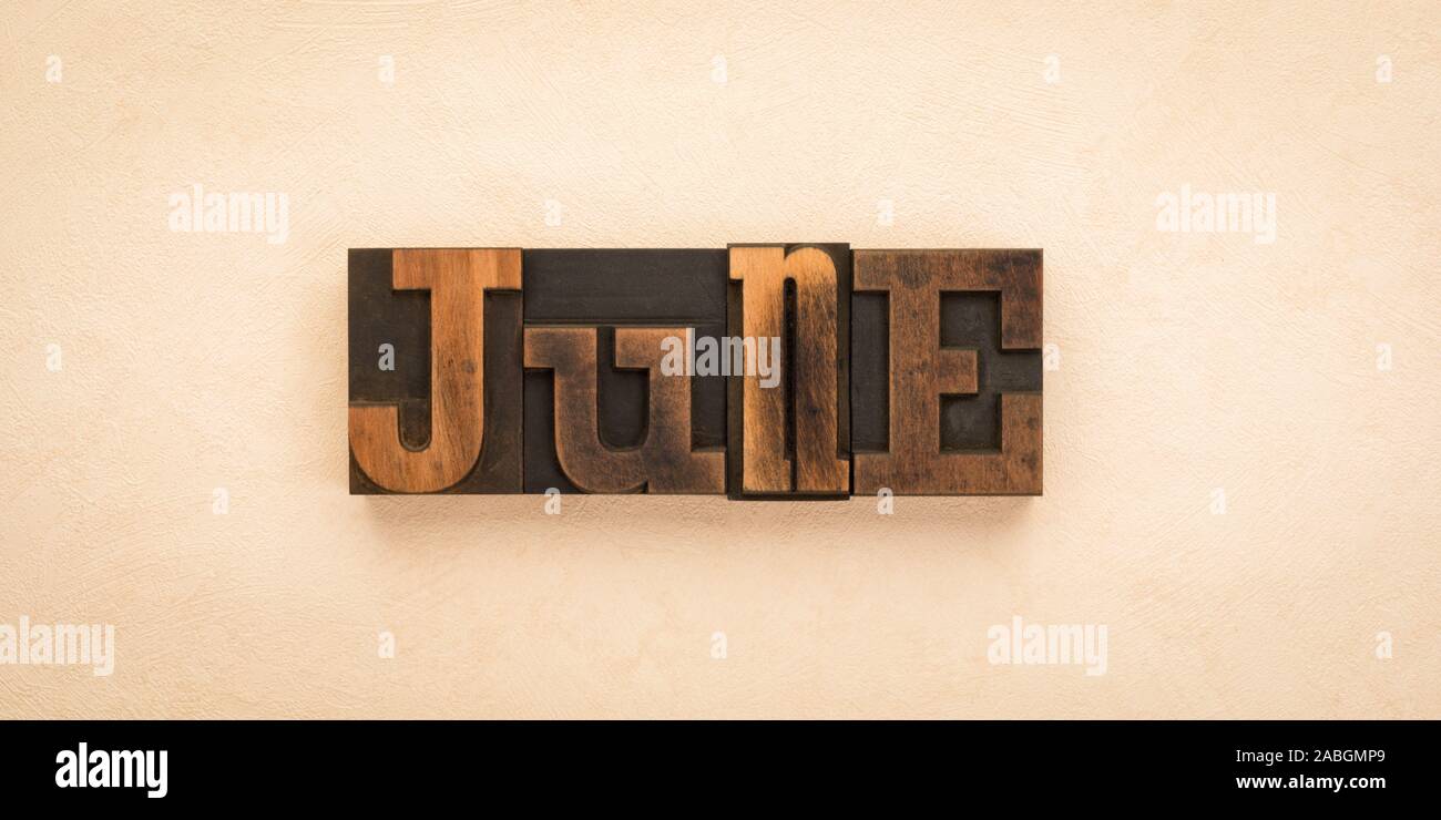 June, name of the month written with vintage letterpress printing ...