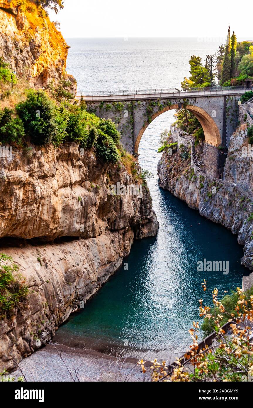 View on Fiordo di Furore arc bridge built between high rocky cliffs ...