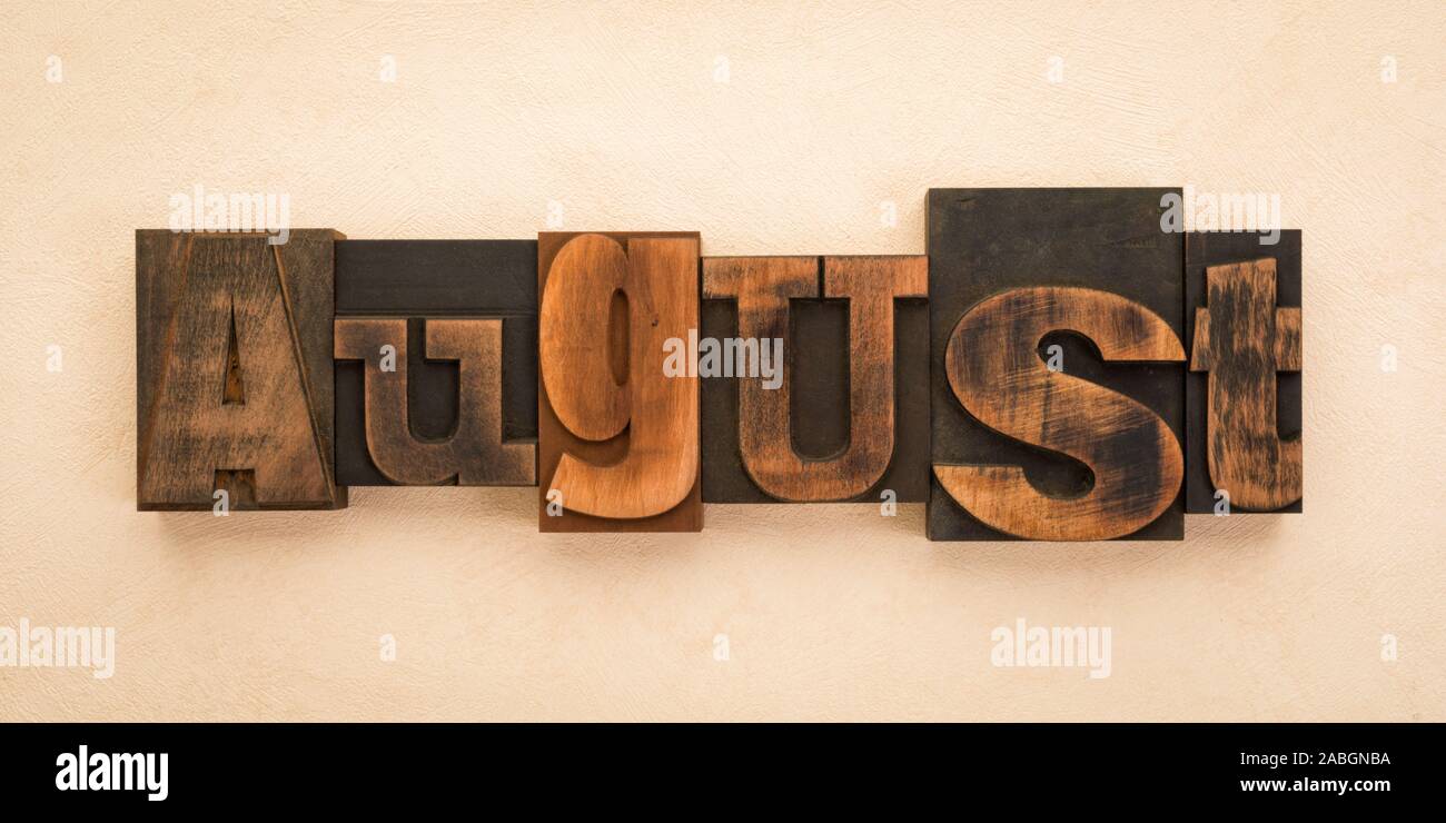 August, name of the month written with vintage letterpress printing ...