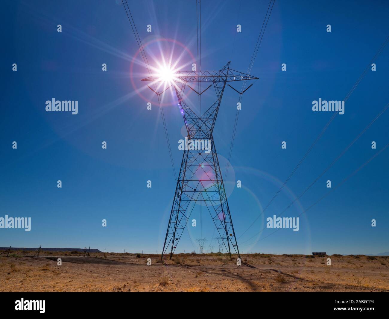 Silhouette High voltage electric towers at sunset time. High-voltage ...