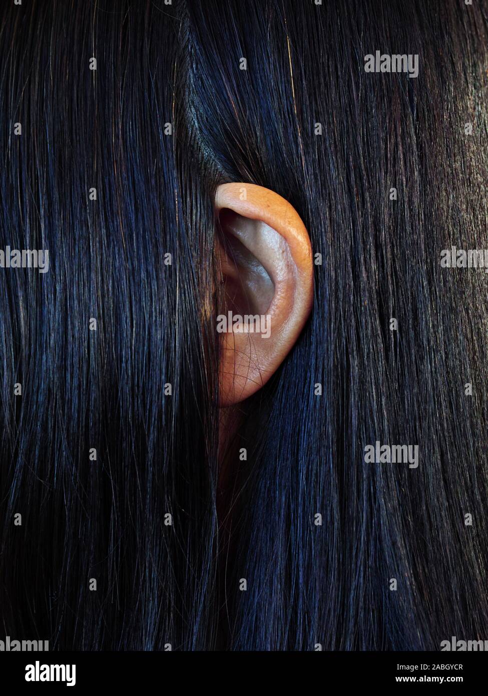 Black human ear lobe hi-res stock photography and images - Alamy